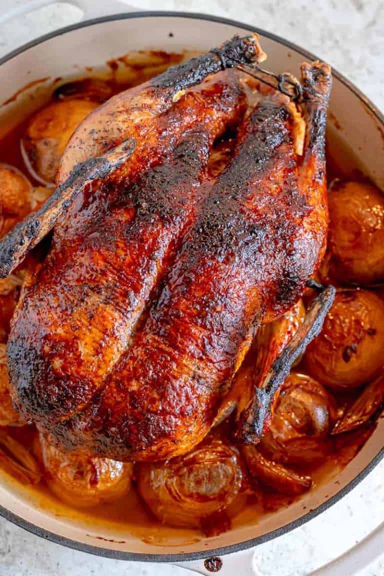 Whole Roast Duck Over Potatoes - Girl With The Iron Cast
