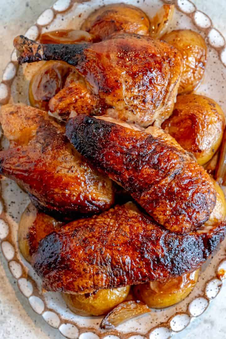 Whole Roasted Duck Over Potatoes - Girl With The Iron Cast