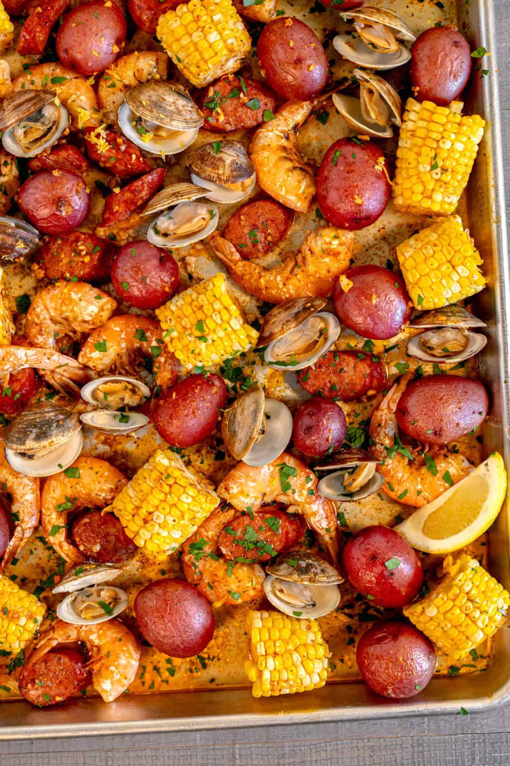 Sheet Pan Seafood Boil with Shrimp, Clams, and Sausage - Girl With The ...