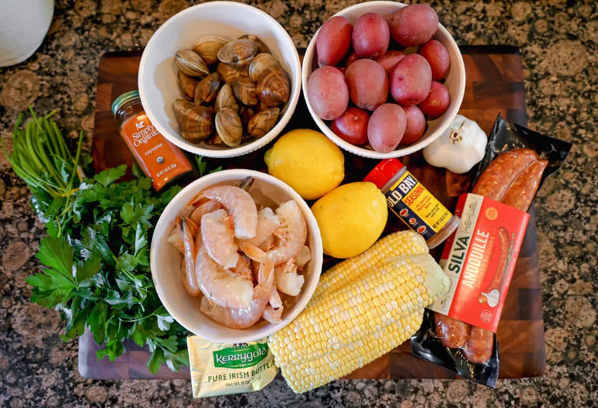 Sheet Pan Seafood Boil with Shrimp, Clams, and Sausage - Girl With The ...